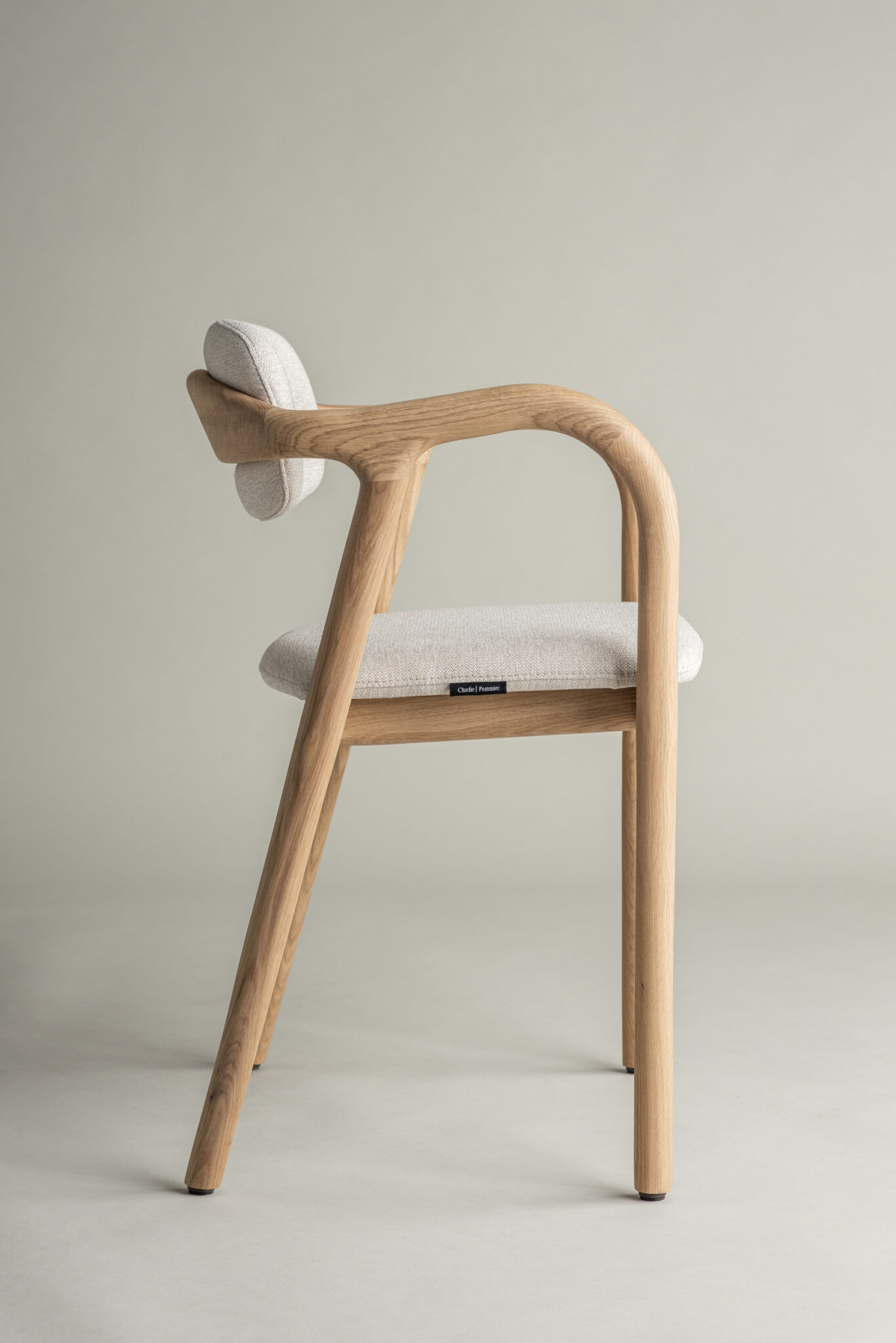 Mosso comfort chair, skillfully crafted from solid wood by Charlie Pommier.